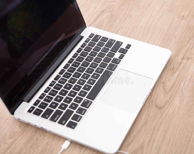 Opened laptop on the table editorial stock image. Image of keys - 196267379