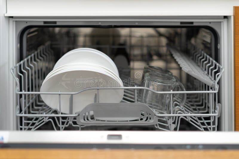 Opened Modern Dishwasher Machine with Plates and Cups on Kitchen Stock ...