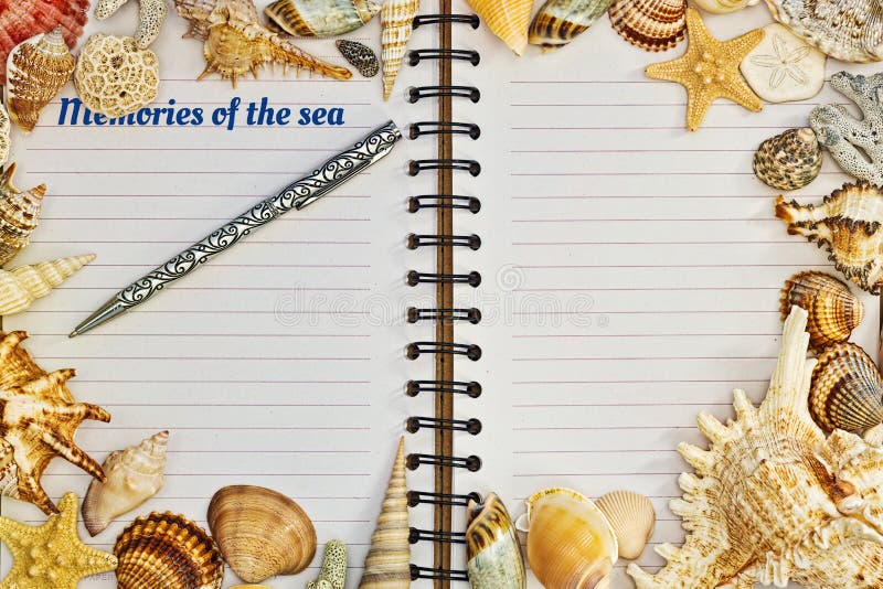 Opened Notebook with a Pen Framed with Sea Shells Stock Photo - Image ...