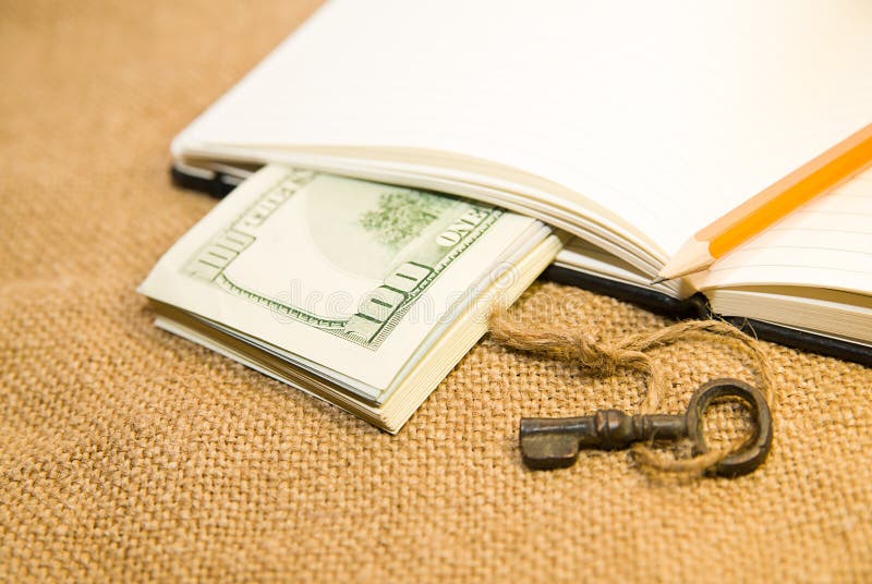 Opened Notebook, Pencil, Key and Money on the Old Tissue Stock Image ...