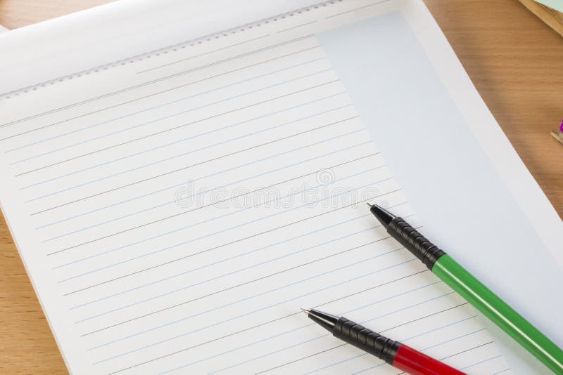 Opened notebook and pens stock image. Image of writing - 20831233