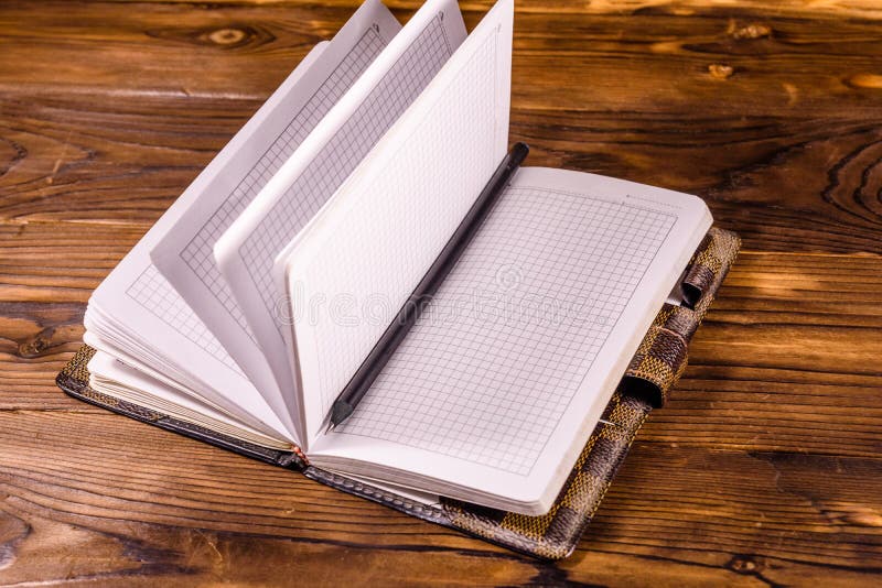 Opened Notepad and Pencil on Wooden Table Stock Photo - Image of ...