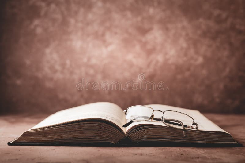 Opened Old Book and Glasses with Copy Space Stock Photo - Image of ...