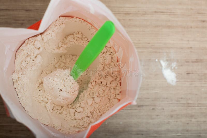Opened Package with Flour and Spoon Inside on the Kitchen Table for ...