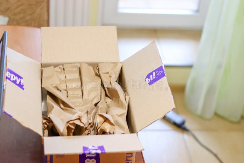 Opened Packaging from the Mail. Home Delivery from an Online Store. Box ...