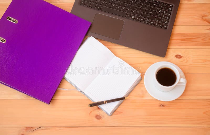 Opened Planner, Pen, Folder, Coffee Cup and Laptop Computer on Desk ...