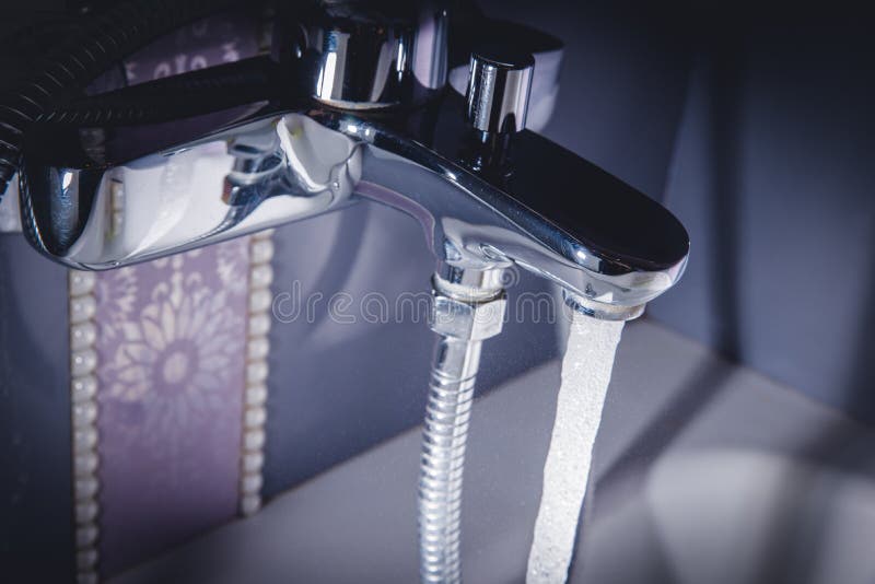 Opened water tap. stock photo. Image of indoor, monochrome - 110078622