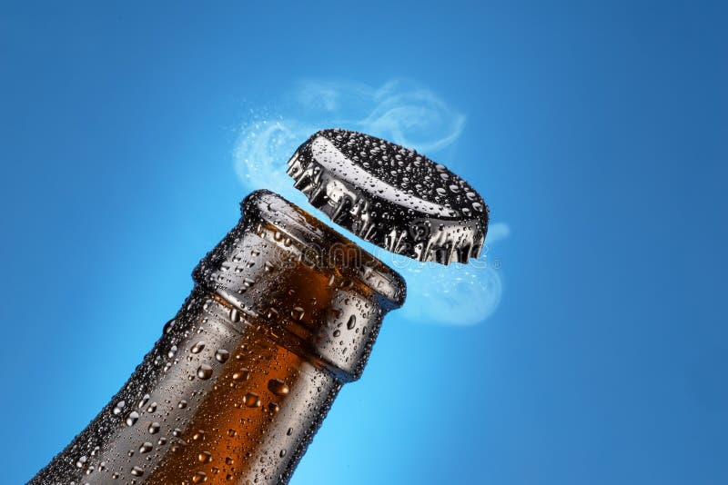 Opening of beer cap stock image. Image of drink, brown - 19046457