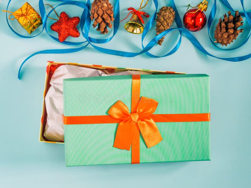 Opening Christmas Gift Box Flat Lay Stock Photo - Image of ribbon ...