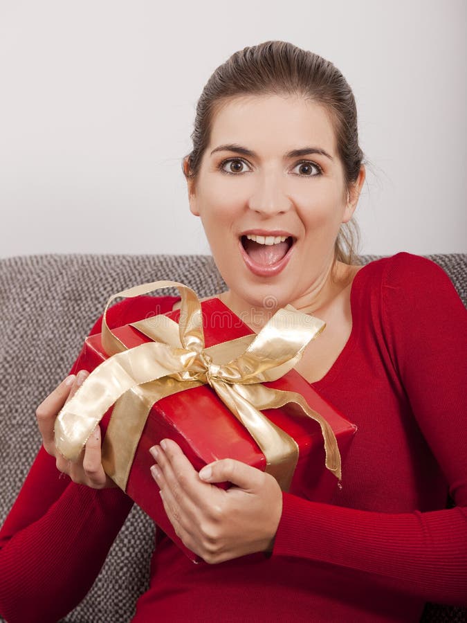Opening a Christmas Present Stock Image - Image of happy, casual: 36207901