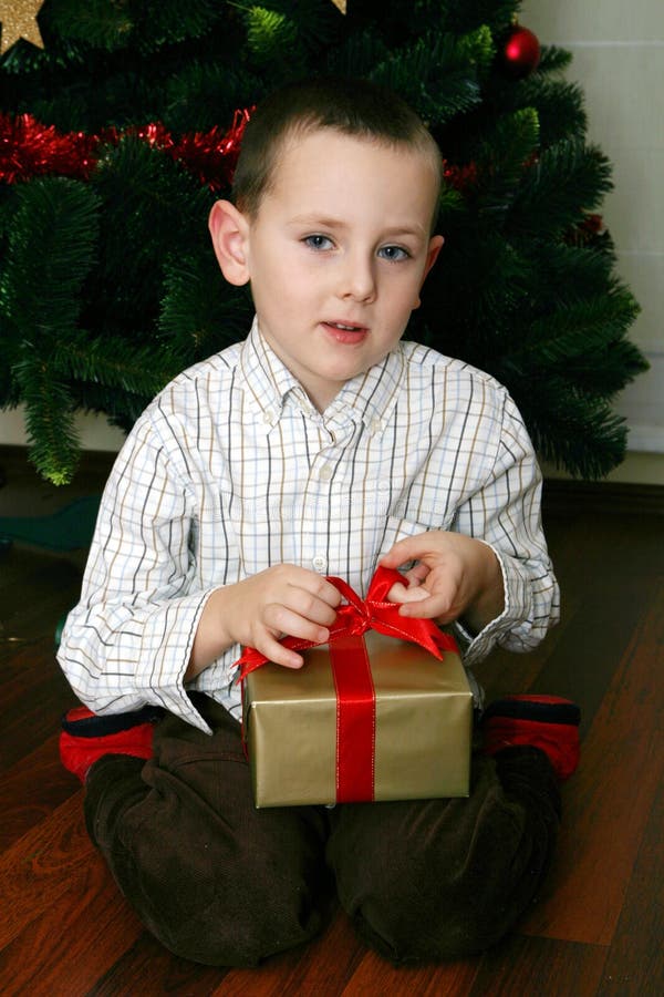 Opening Christmas presents stock image. Image of caucasian - 11324519