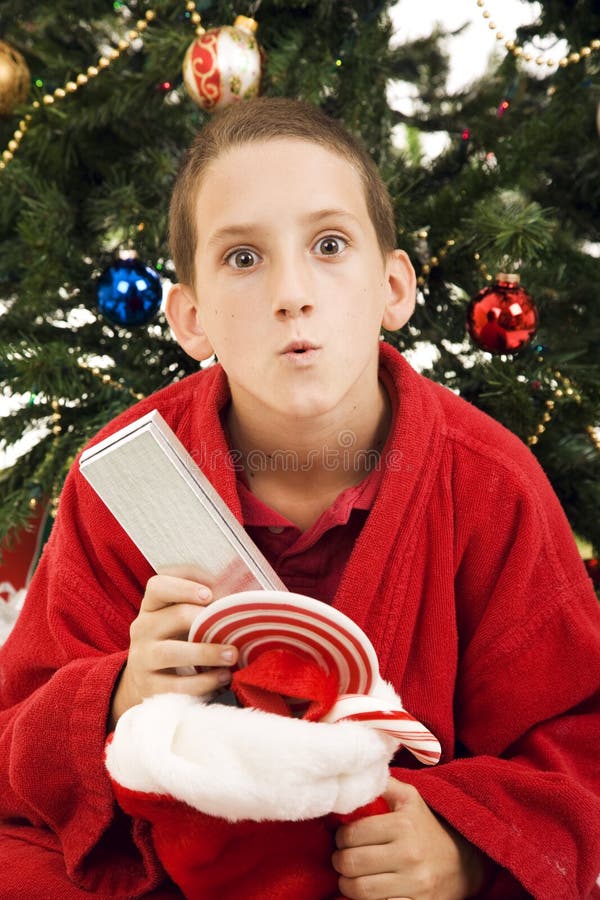 Opening Christmas Stocking stock image. Image of excited - 11442169