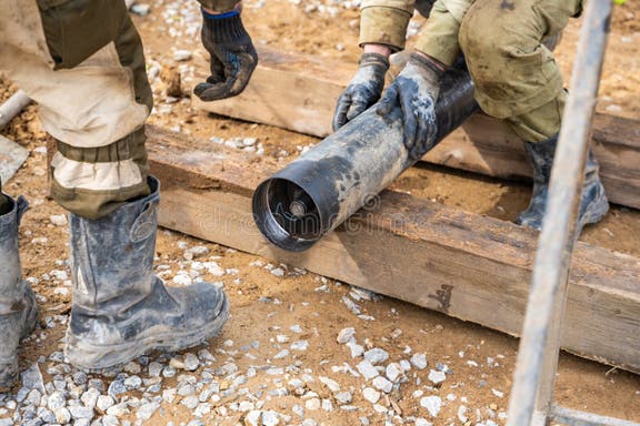 Opening of Container with Soil Sample Extracted from Borehole ...