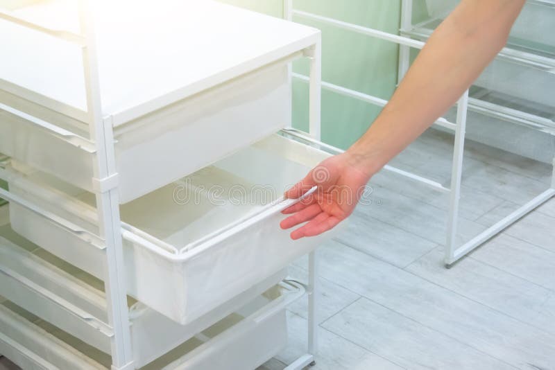 Opening a Drawer for Things, a Person`s Hand Opens the Empty Drawer ...