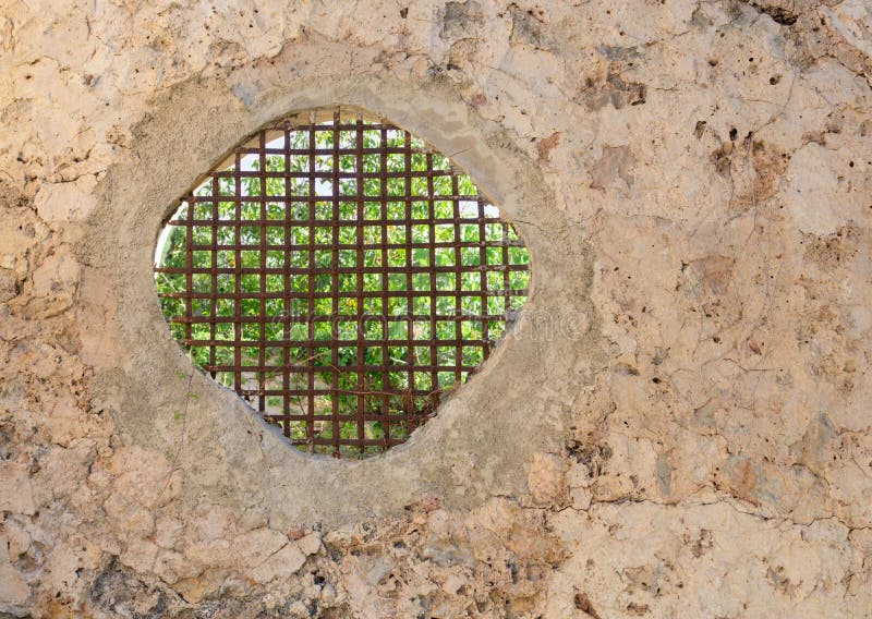 Opening with Grid in Old Stone Wall Stock Image - Image of balearic ...