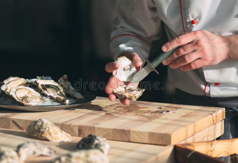 Opening the Hollow and Flat Oysters. Chef Opens Oysters in the ... Opening the Hollow and Flat Oysters. Chef Opens Oysters in the ...
