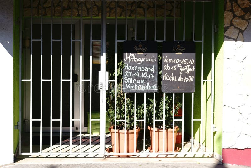 Opening Hours at the Iron Gate Stock Image - Image of blackboard ...
