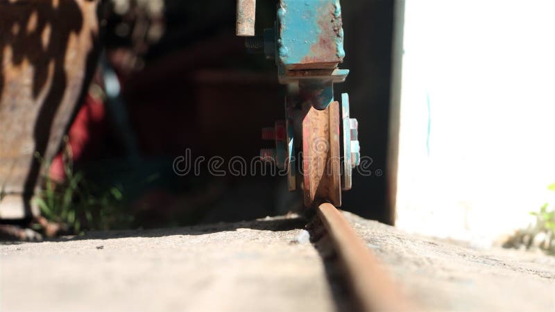 The Opening a Metal Gate by Riding of Wheel on the Rail. Stock Video ...