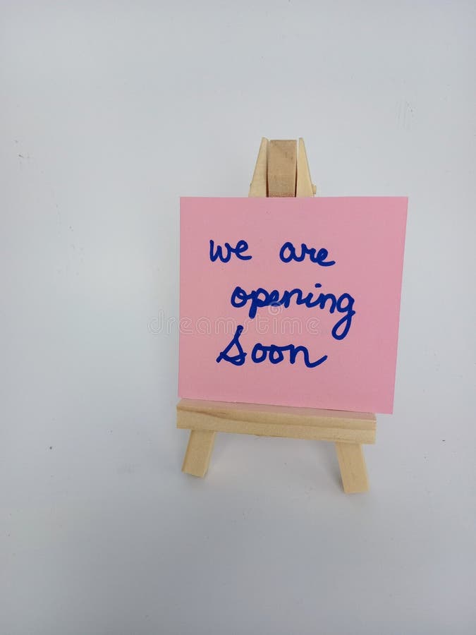 We are Opening Soon Sign on a Wood Easel on a White Background Stock ...