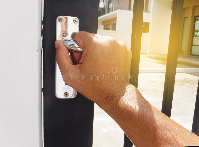 Opening the steel gate stock photo. Image of metallic - 98182500