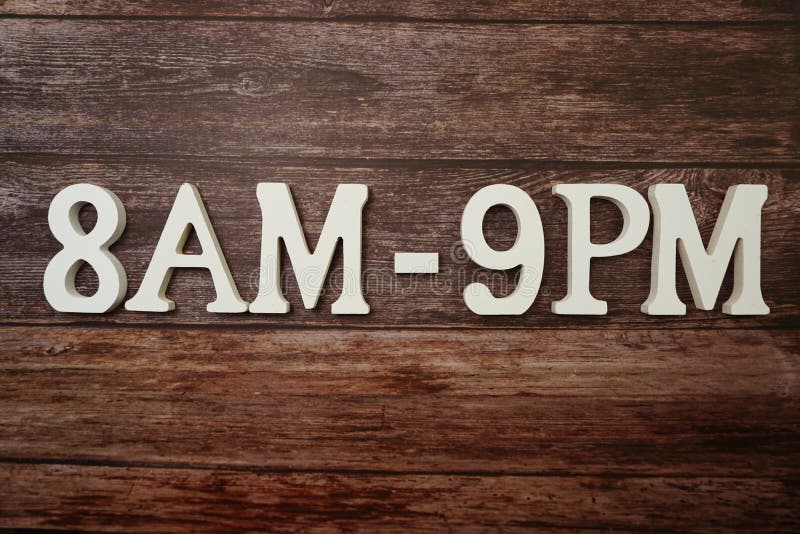 Opening Times 8 am To 9 Pm Letter on Wooden Background Stock Photo ...