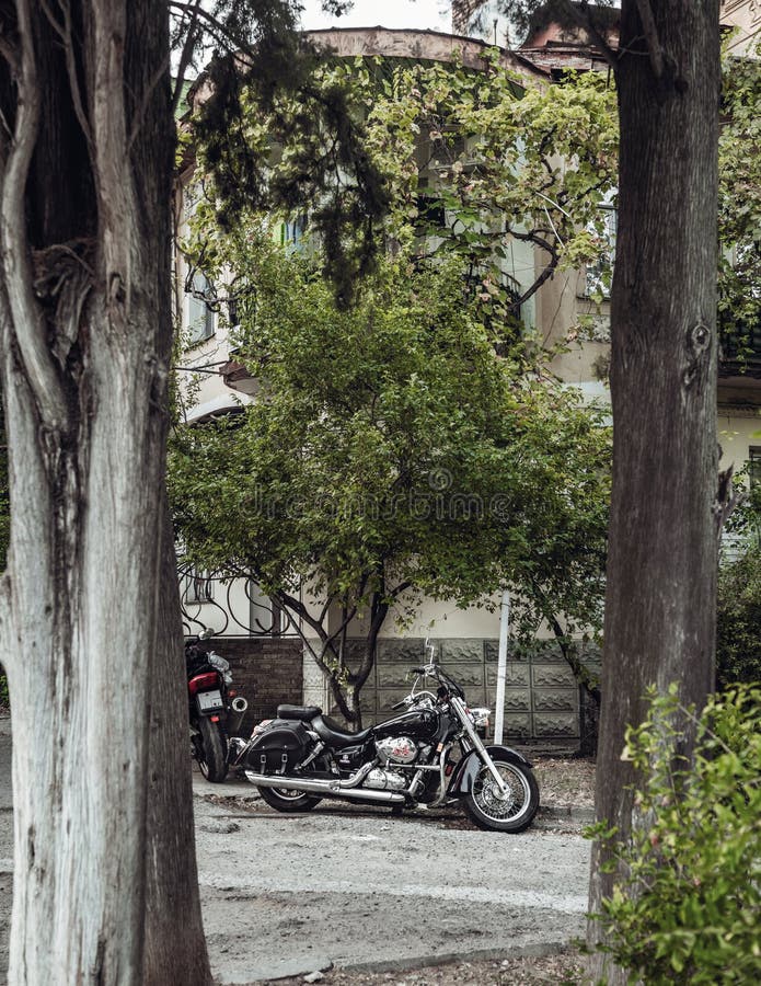 Two Motorcycles Standing in the Courtyard of a Provincial Town Stock ...