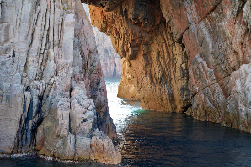 Opening between Two Cliffs in the Ocean Stock Photo - Image of ...