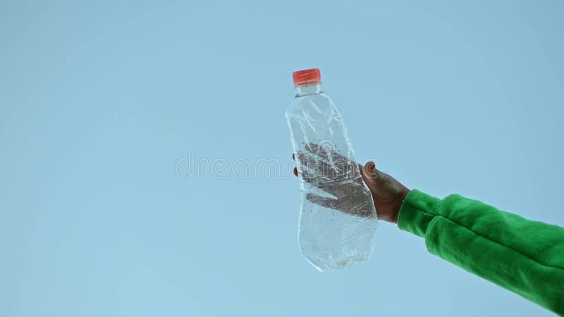 Opening Your Hand and Dropping a Plastic Bottle in Slow Motion Stock ...