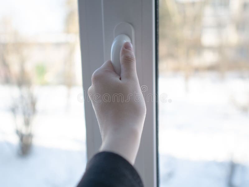 Opens the Window with His Hand To Ventilate the Room. White Window ...