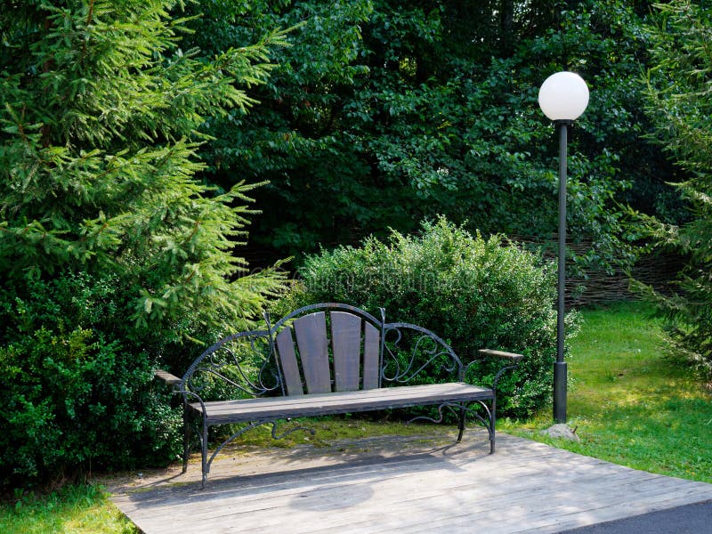 Openwork Bench in a Picturesque Green Place Stock Photo - Image of peak ...