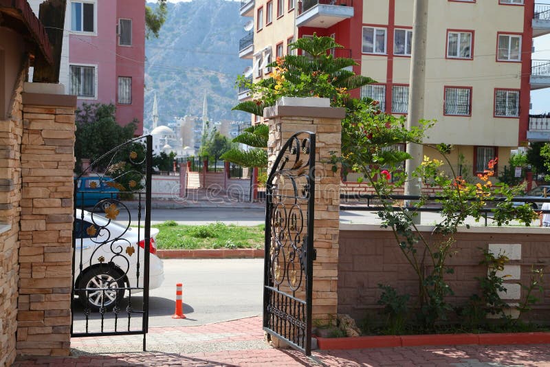 The Openwork Forged Gate in the City Yard Stock Photo - Image of autumn ...