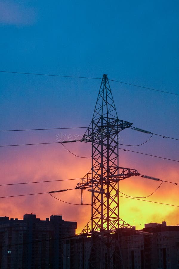 Openwork Tower Power Lines on a Bright Sunset Sky Stock Image - Image ...