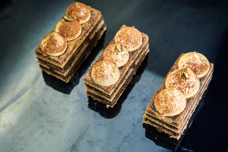 Opera Cake Slices on Mirror Background Stock Photo - Image of ...