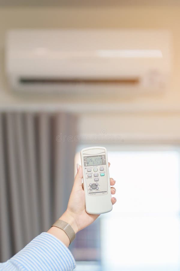 Operating and Adjusting Air Conditioner Temperature by Remote Control ...