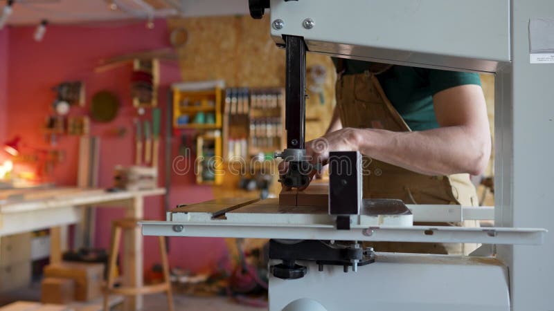 Using Band Saw Machine Vertical Equipment for Straight Curved Angled Cuts. Carpenter Work in ...