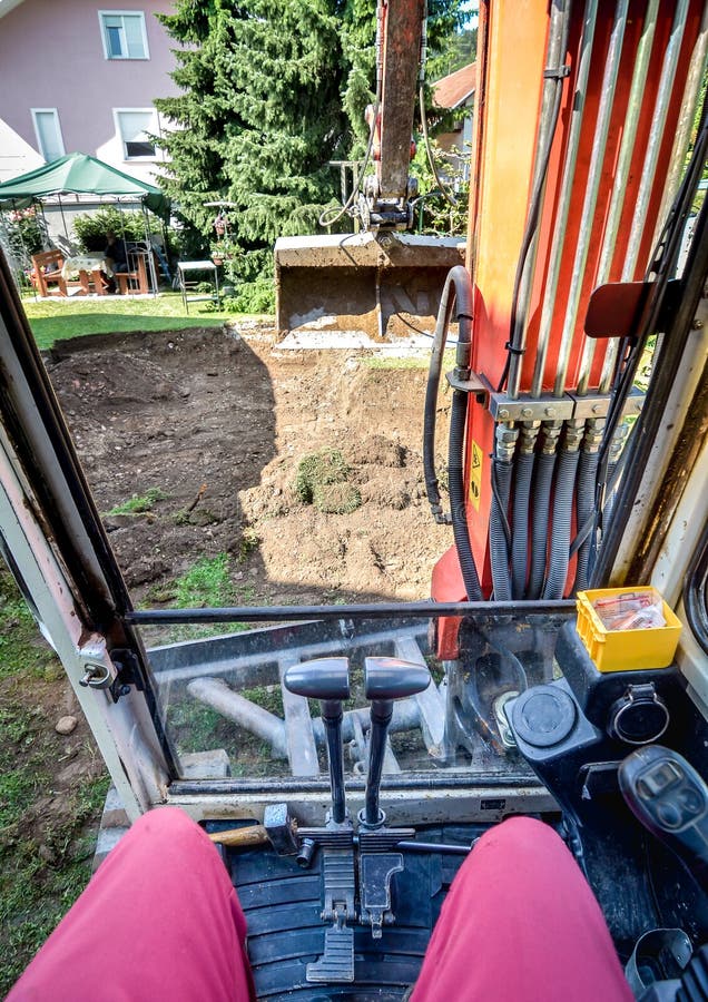 Operating a Digger or Excavator Stock Photo - Image of bulldozer ...