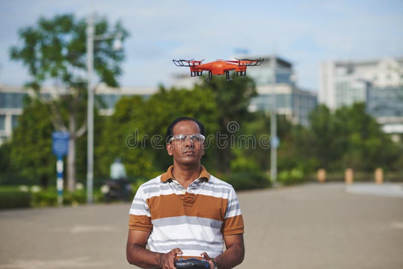 Operating Drone during Walk in Park Stock Image - Image of technology ...