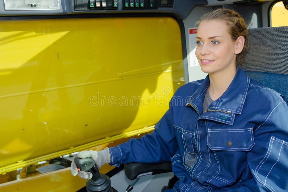 She Operating Heavy Equipment Stock Photo - Image of drive, heavy ...