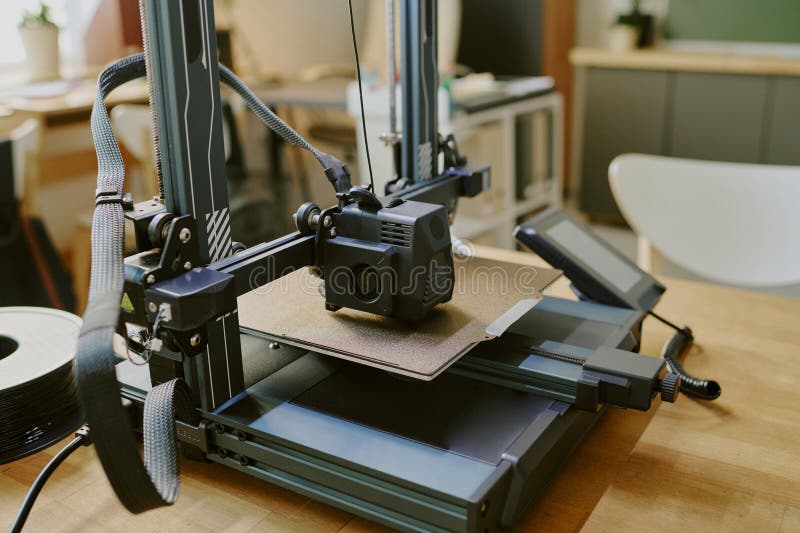 Operating High-Precision 3D Printer in Modern Workspace Stock Image ...