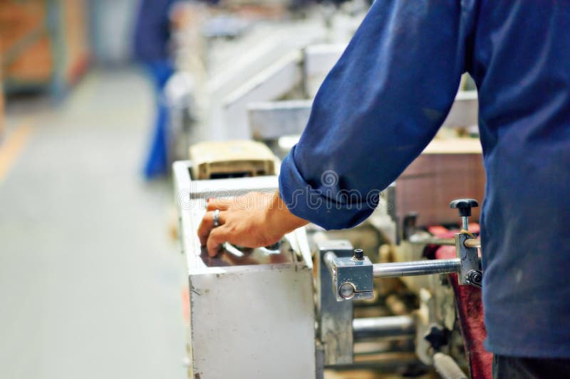 Operating the Machine with Accuracy. Cropped Image of a Factory Worker ...