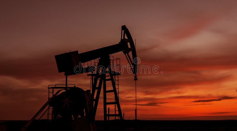 Operating Oil and Gas Well Contour, Outlined on Sunset Stock Image ...