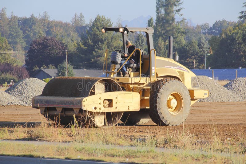 Operating a Steamroller stock image. Image of flatten - 75869999