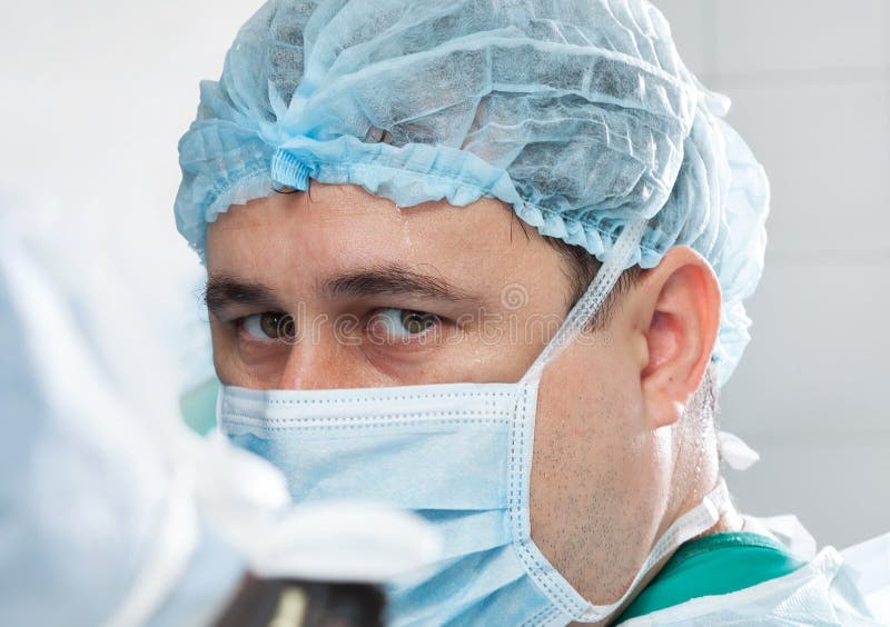 Operating surgeon stock photo. Image of surgery, clinic - 61934378