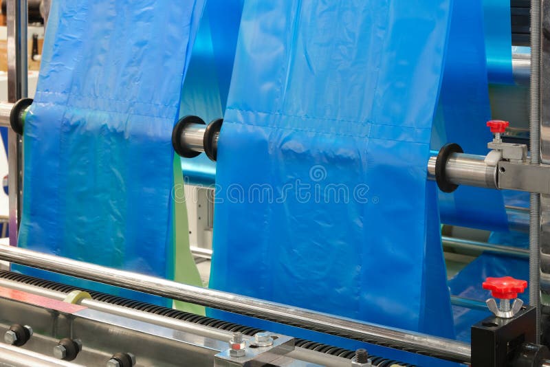 The Operation of Automatic Plastic Bag Production Machine. Close-up of ...