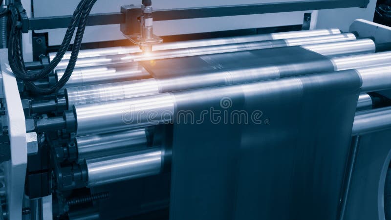 The Operation of Automatic Plastic Bag Production Machine. Close-up of ...