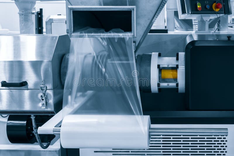 The Operation of Automatic Plastic Bag Production Machine. Close-up of ...