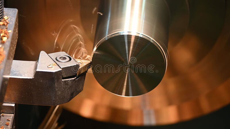 The Operation of Lathe Machine Cutting the Brass Shaft Material. Stock ...