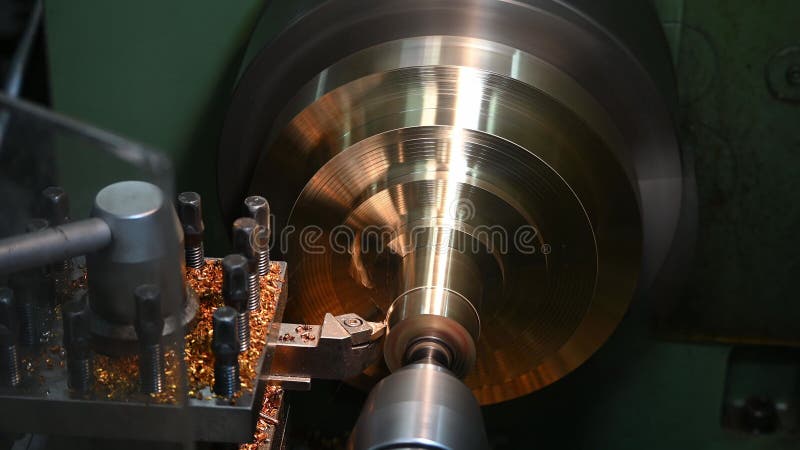 The Operation of Lathe Machine Cutting the Brass Shaft Material. Stock ...