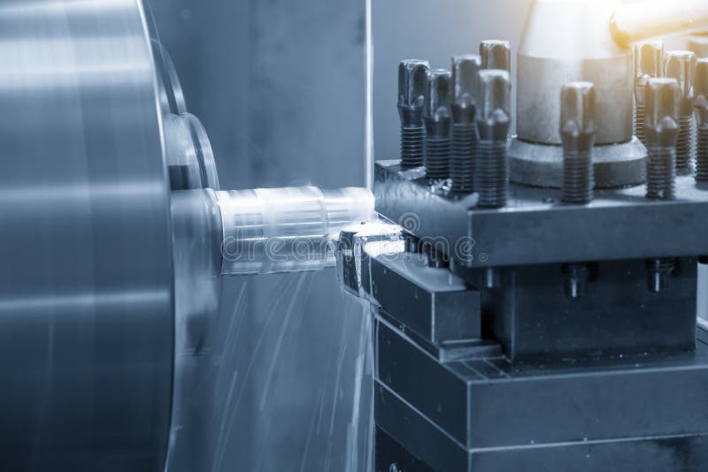 The Operation of Lathe Machine Cutting the Brass Shaft Parts . Stock ...