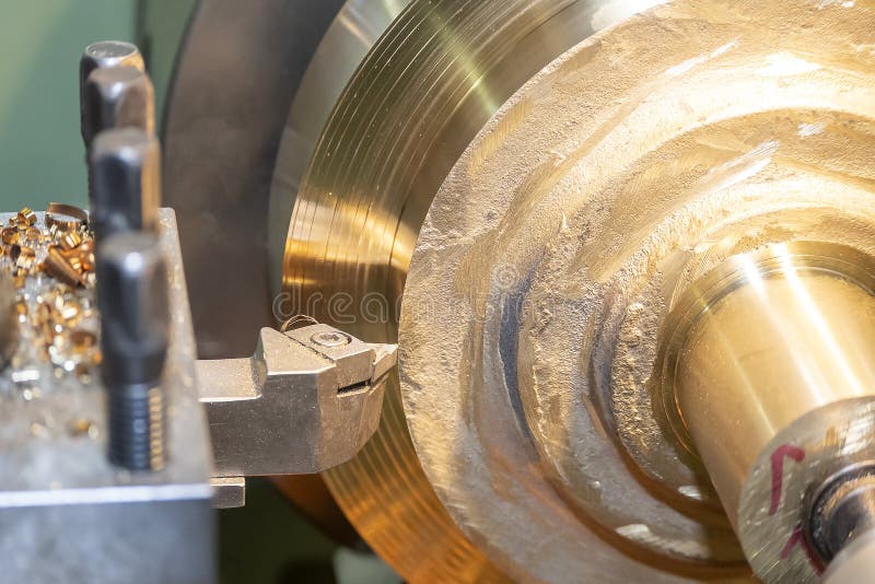 The Operation of Lathe Machine Cutting the Brass Shaft Parts with the ...